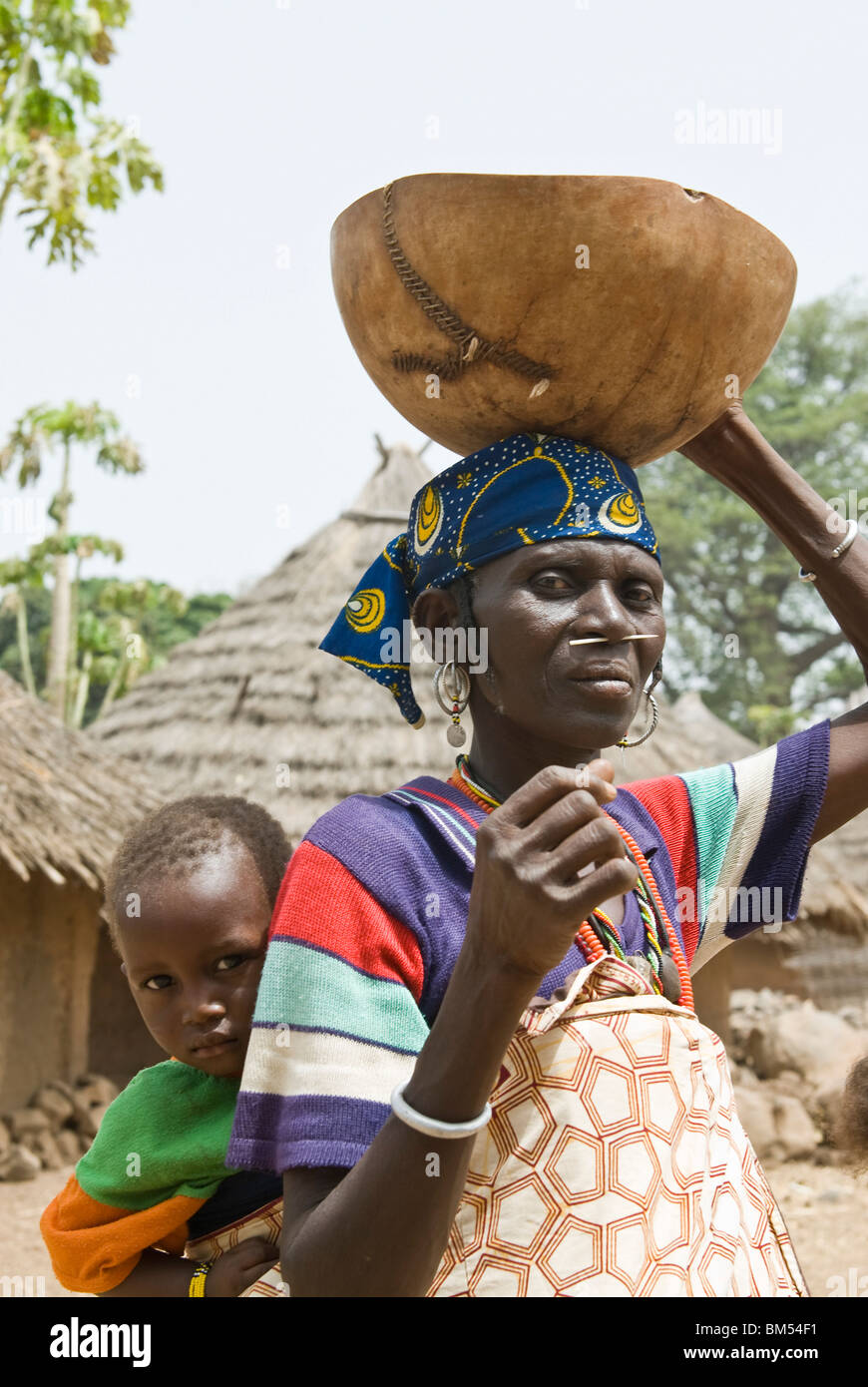 African bedik women carrying children, Iwol village, Bassari country ...