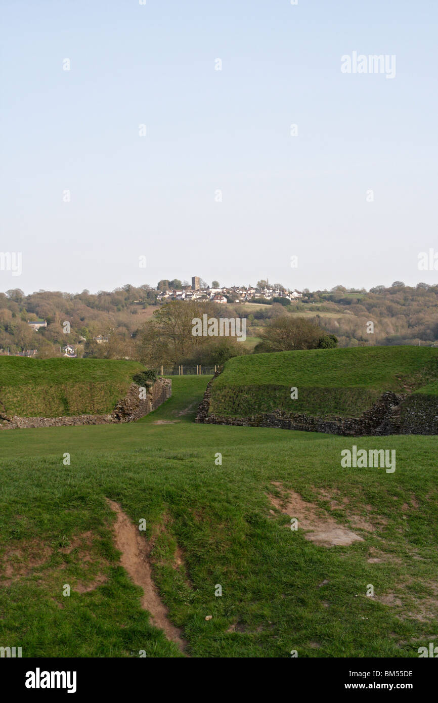 The Roman Amphitheater at Caerleon near Newport, Wales with the village ...