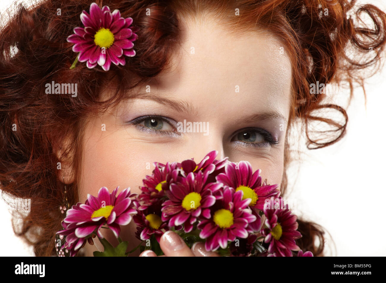 Portrait of a happy women with flowers Stock Photo - Alamy