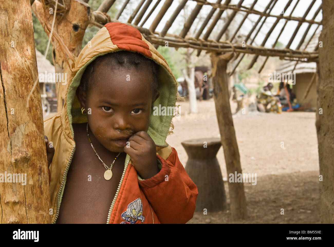 Bassari girl looking shy to the camera. Ethiolo village, Bassari ...