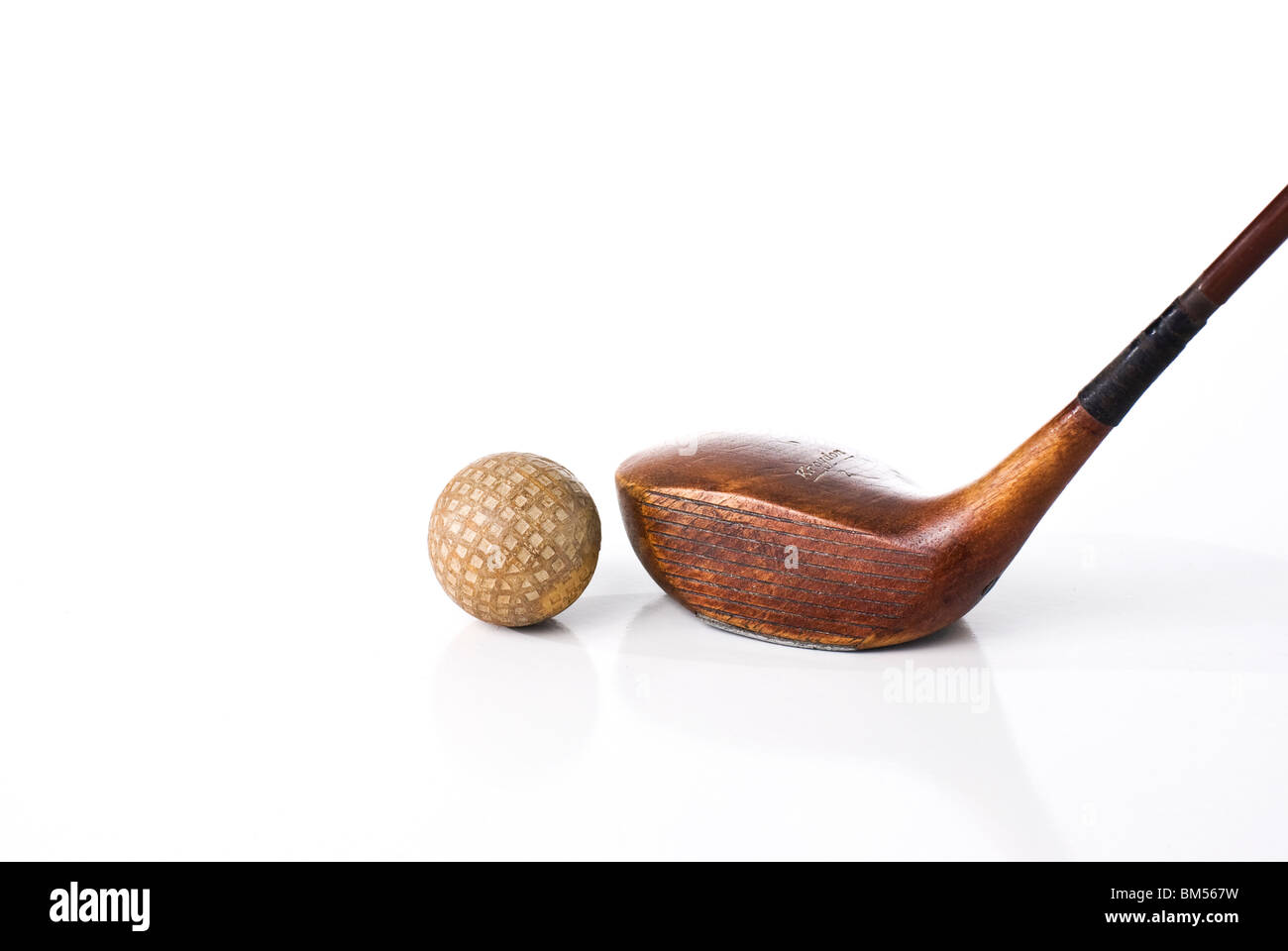 Antique golf ball and wooden driver Stock Photo - Alamy