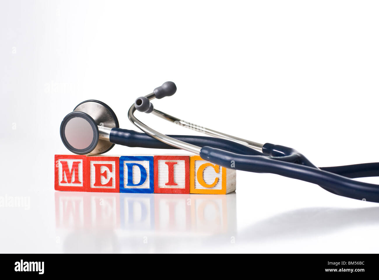 Colorful children's blocks that spell MEDIC with a stethoscope Stock ...