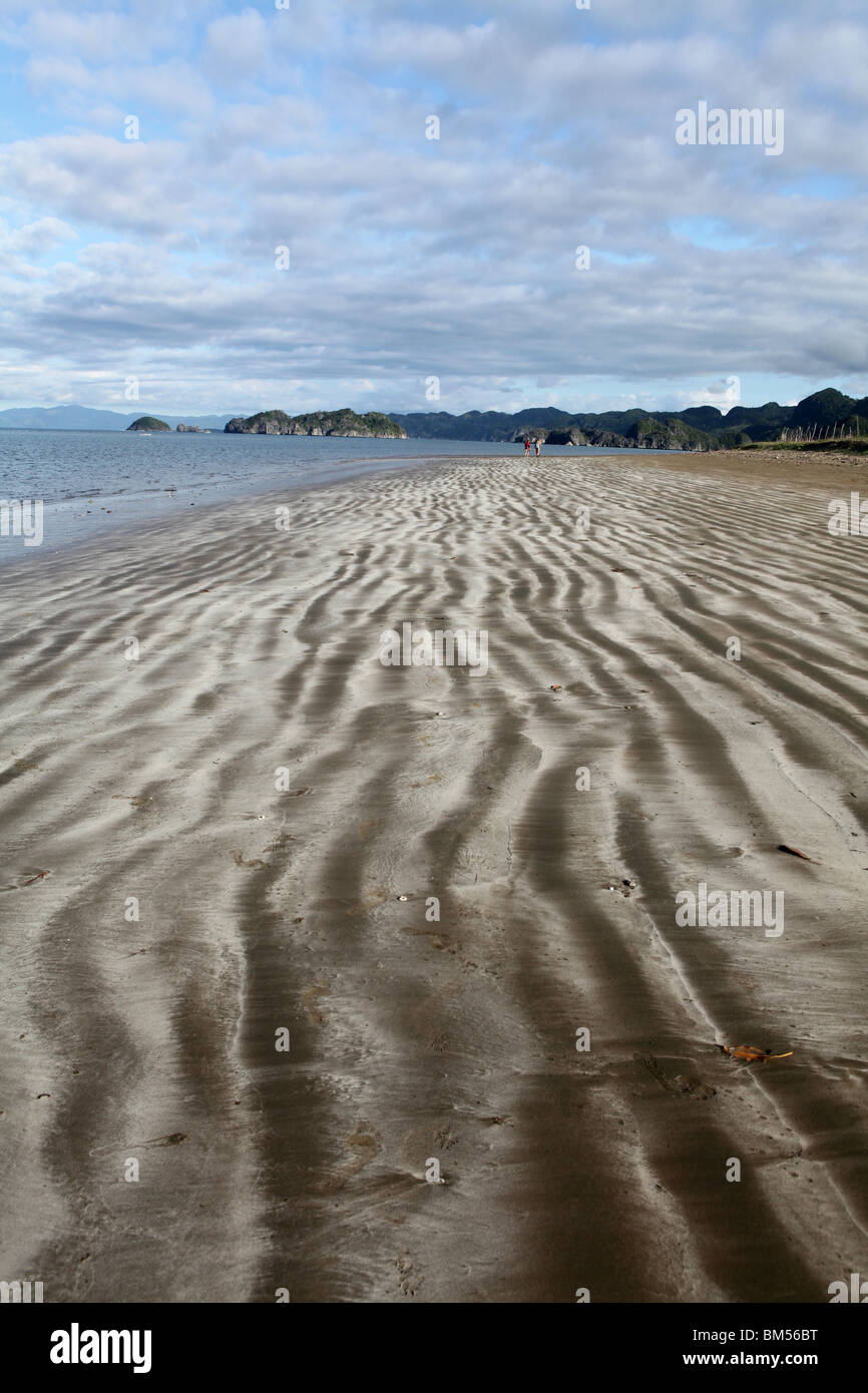 The local beach at Paniman Village, a gateway to the islands of the ...