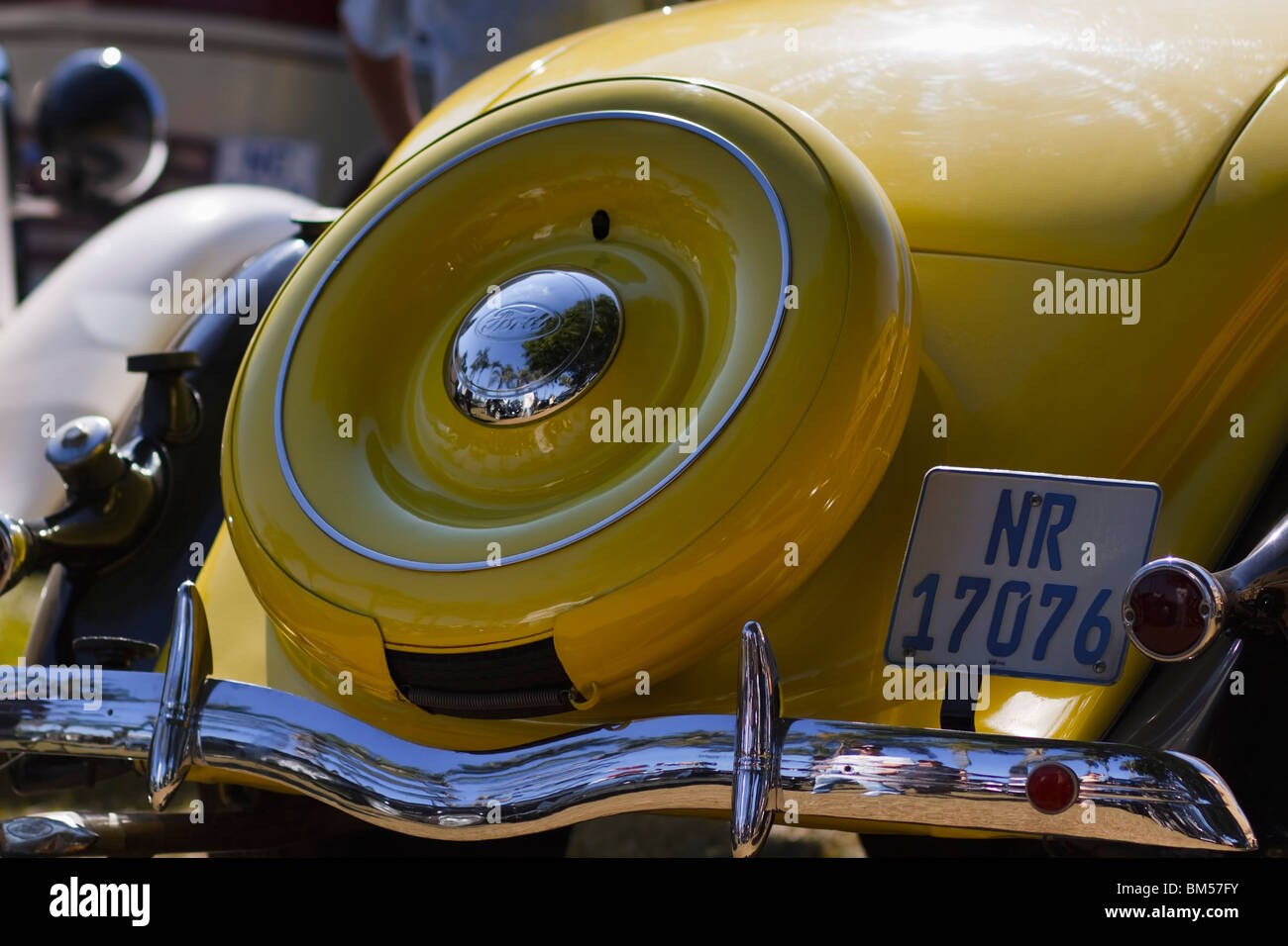 Close-up rear view of a yellow classic Ford roadster Stock Photo - Alamy