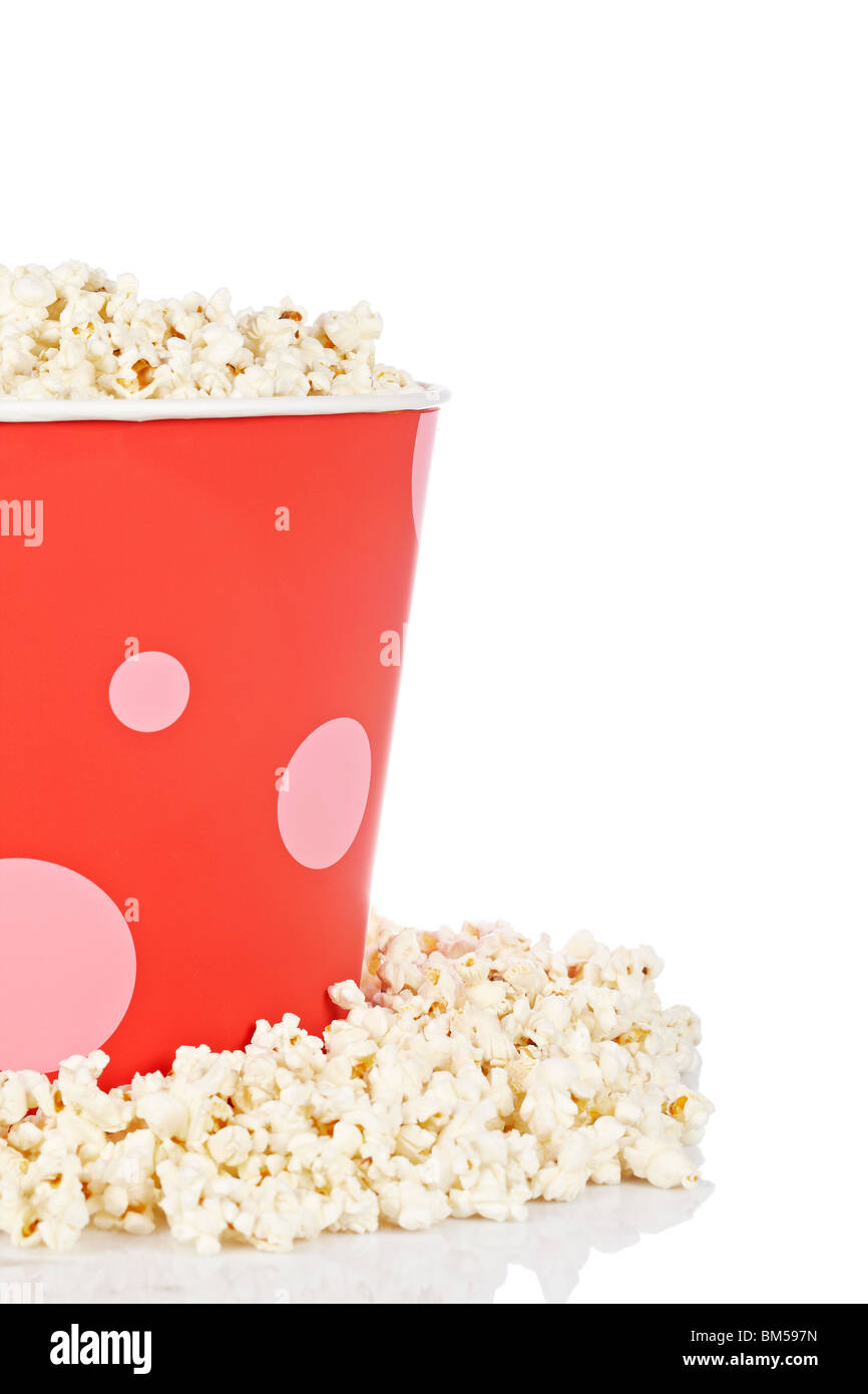 Detail of popcorn in a bucket over a white background Stock Photo - Alamy