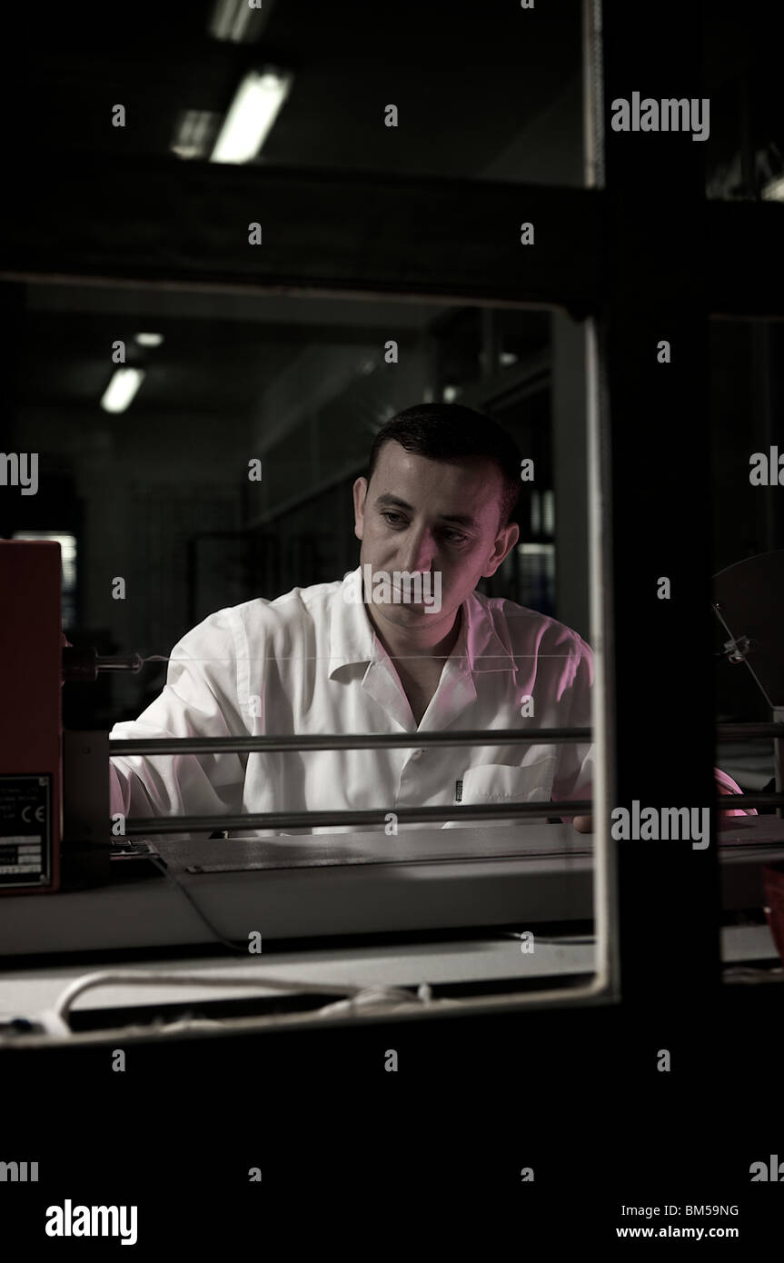 Quality control in a denim factory Stock Photo - Alamy