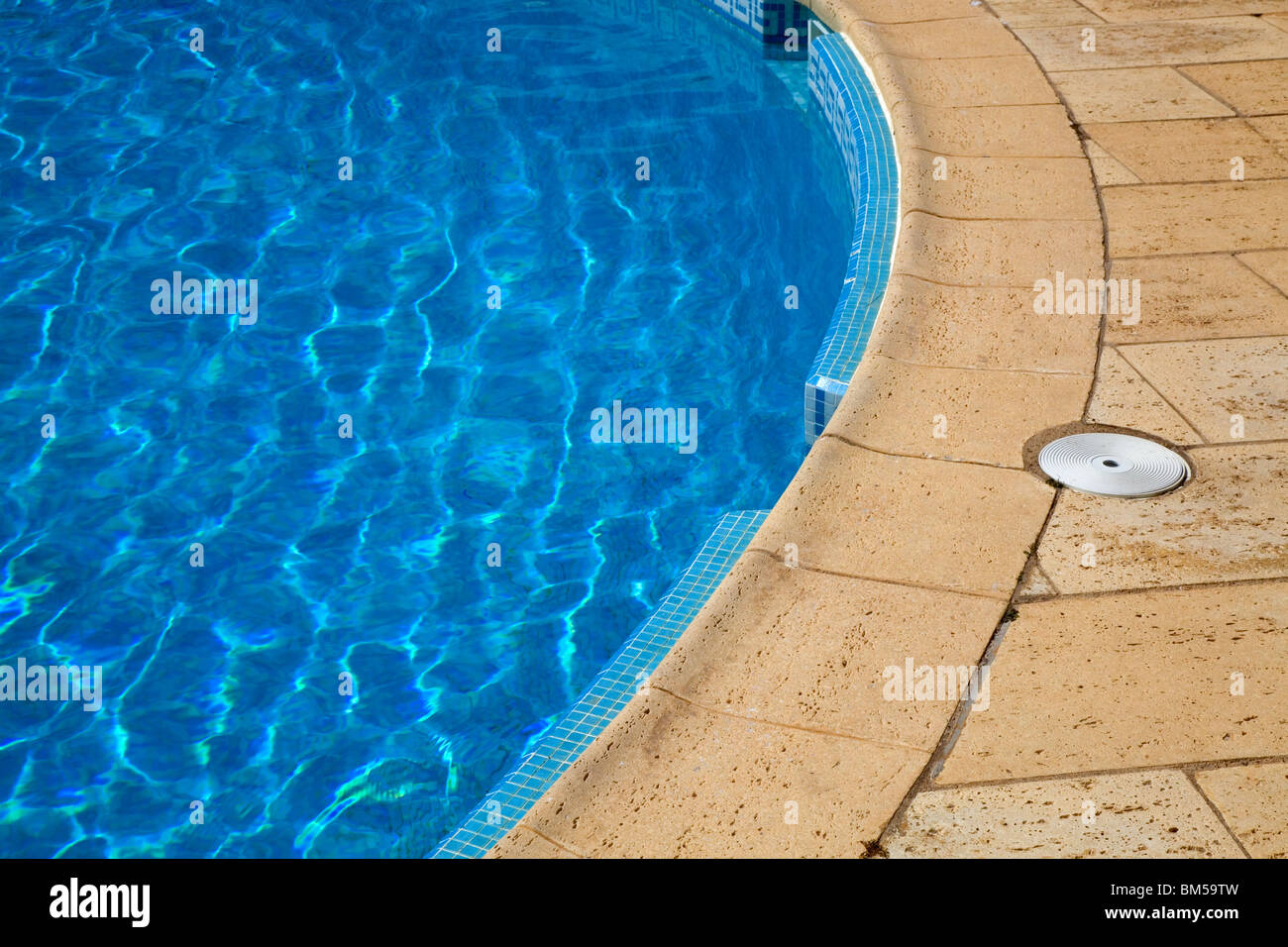 swimming pool blue water detail in summer time Stock Photo - Alamy