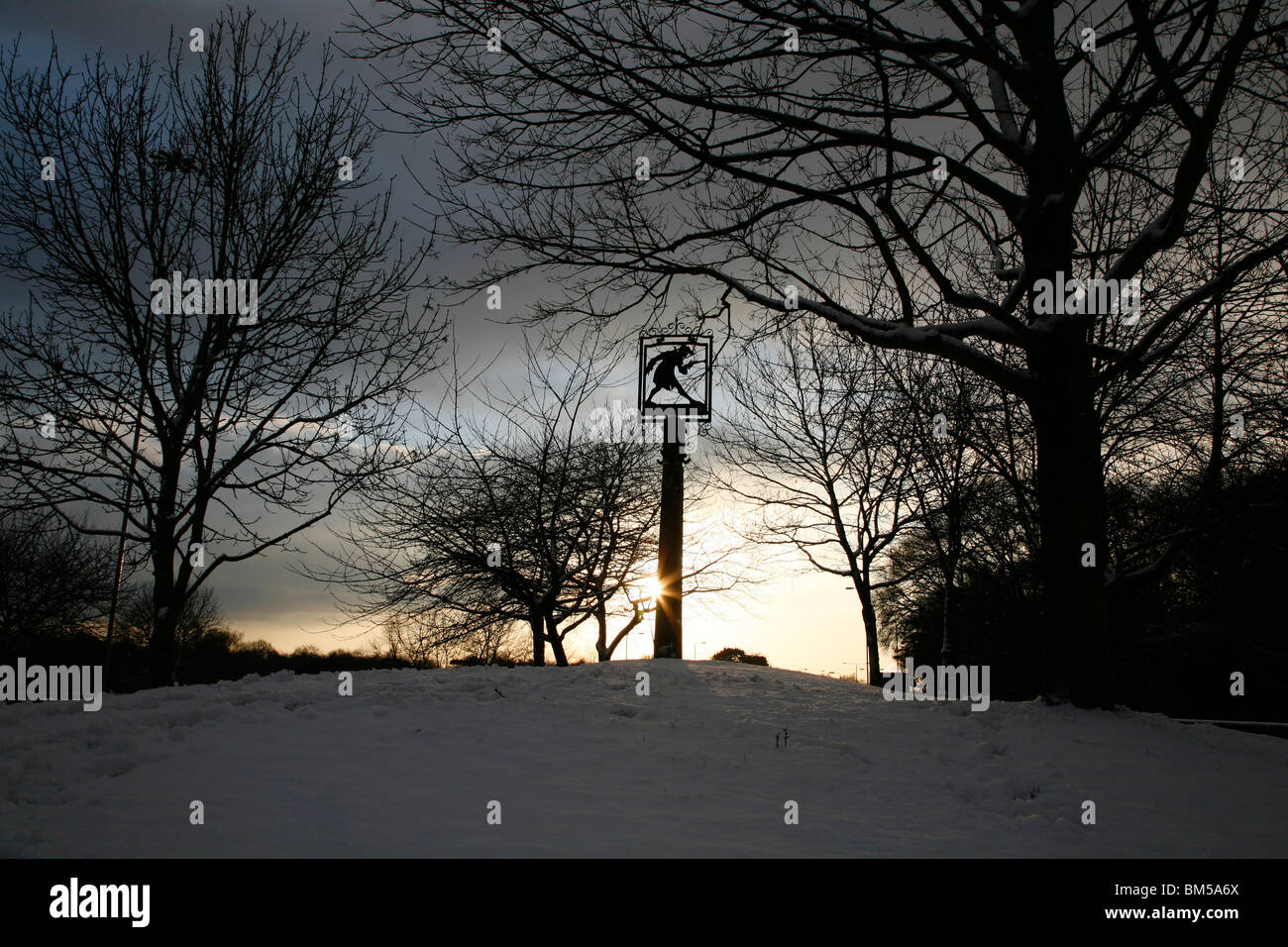 Highwayman sign at a snowbound Tibbet's Corner, Putney Heath, London ...