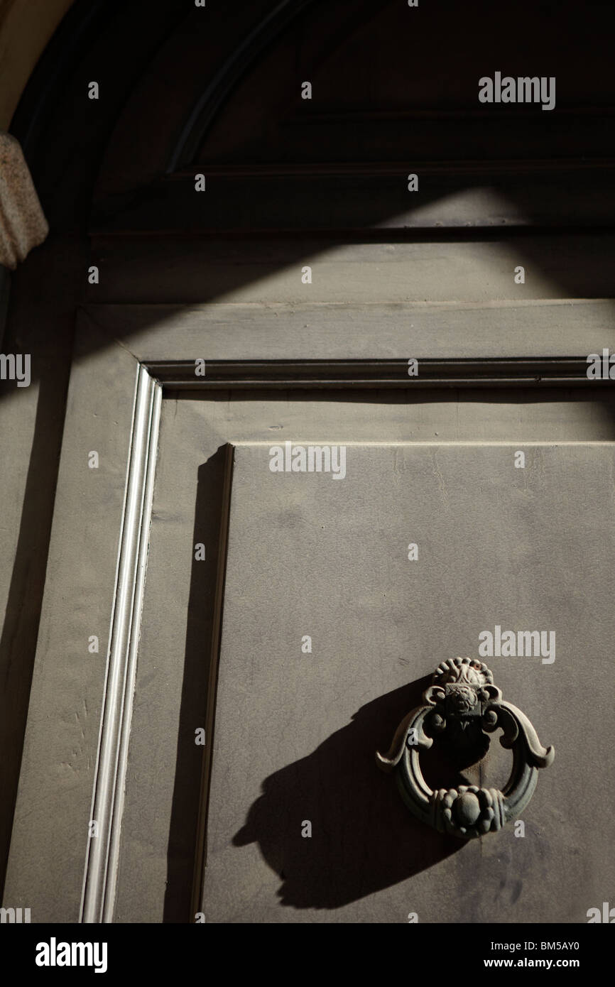Fancy door knocker in Milan, Italy Stock Photo - Alamy