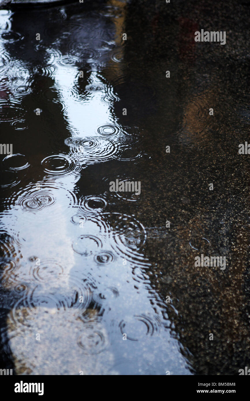 Abstract rain drops on ground Stock Photo - Alamy