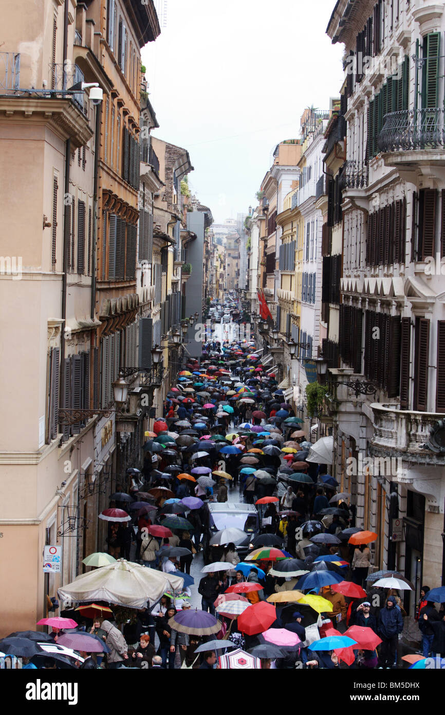 People with umbrellas under the rain. Rome Italy Europe Stock Photo - Alamy