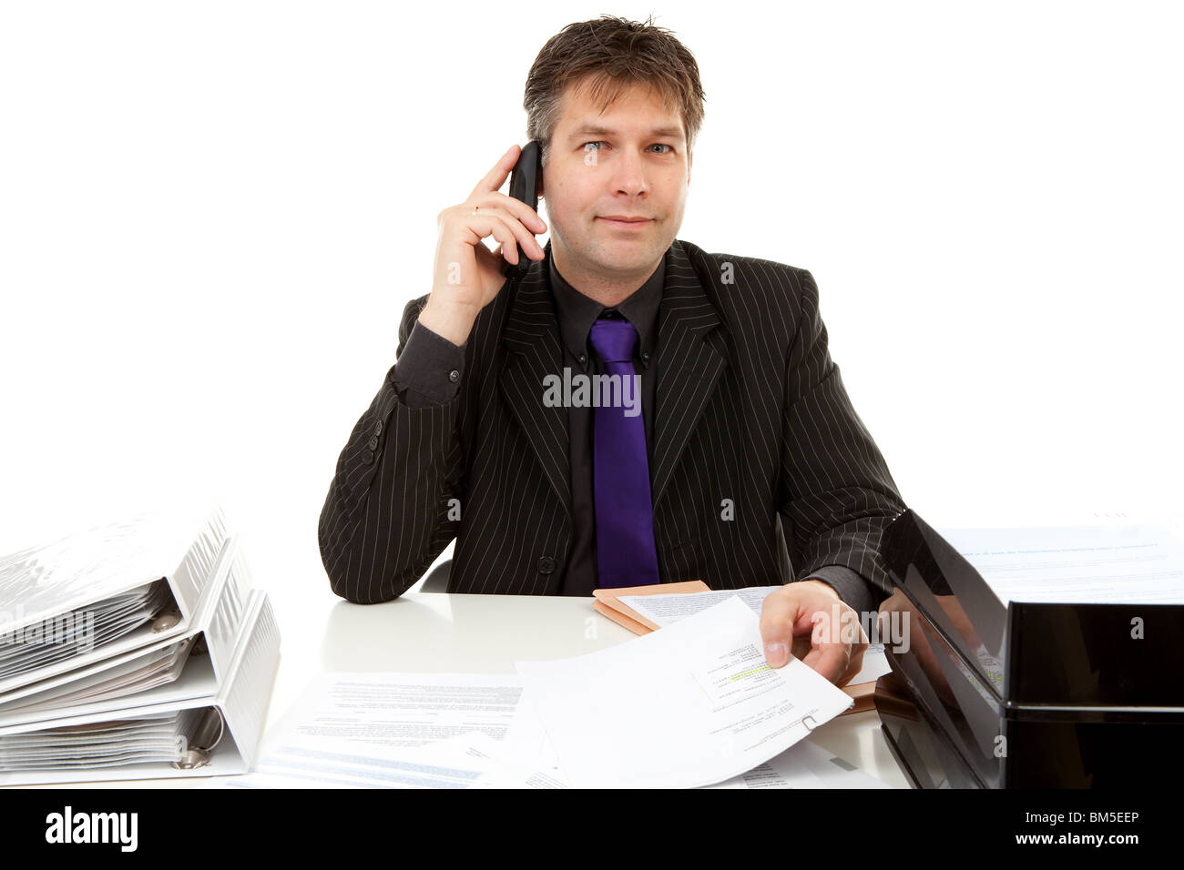 Businessman at work is calling on the phone over white background Stock ...
