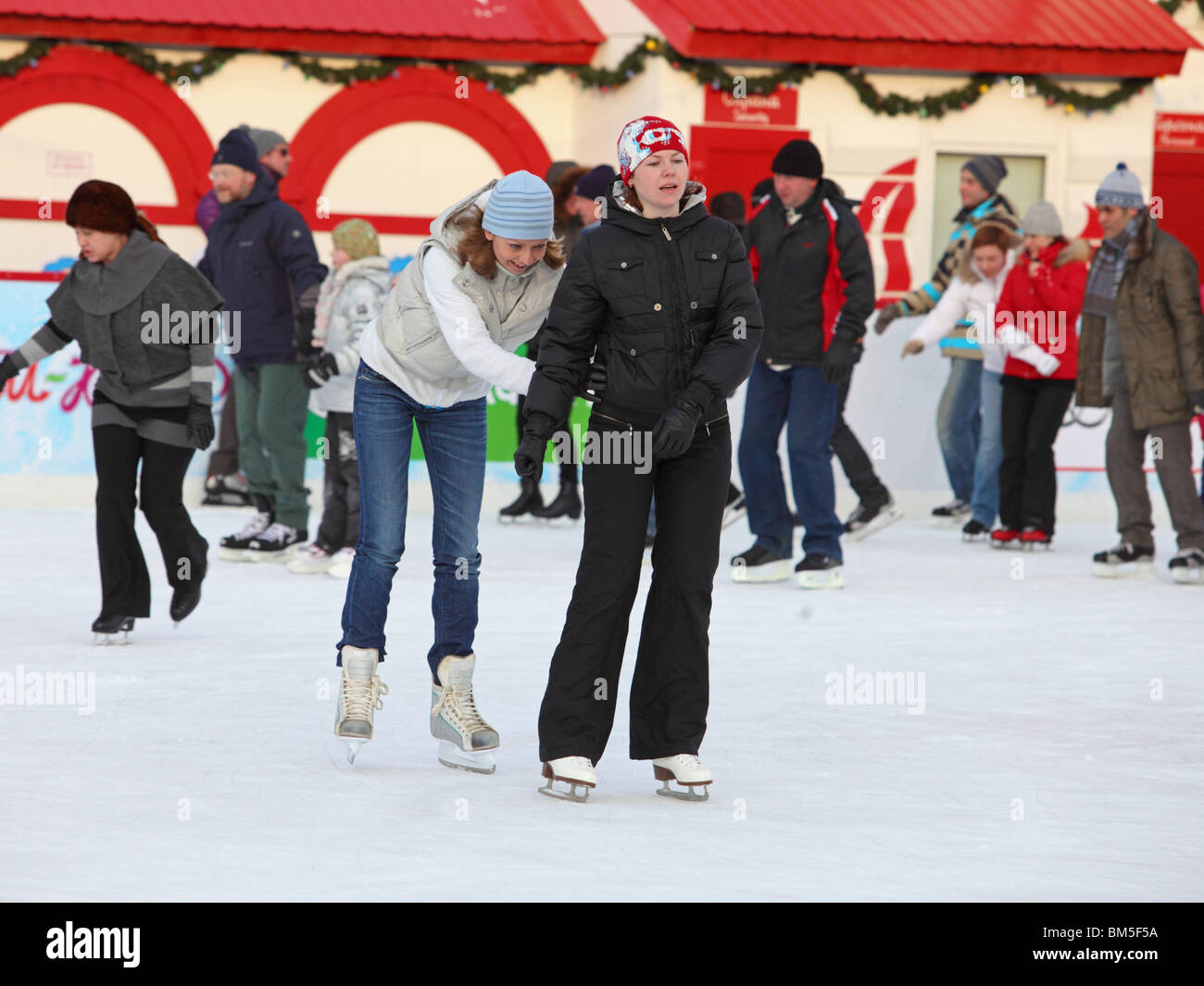 Ice skaters at a public ice skating rink on Red Square, Moscow, Russia ...