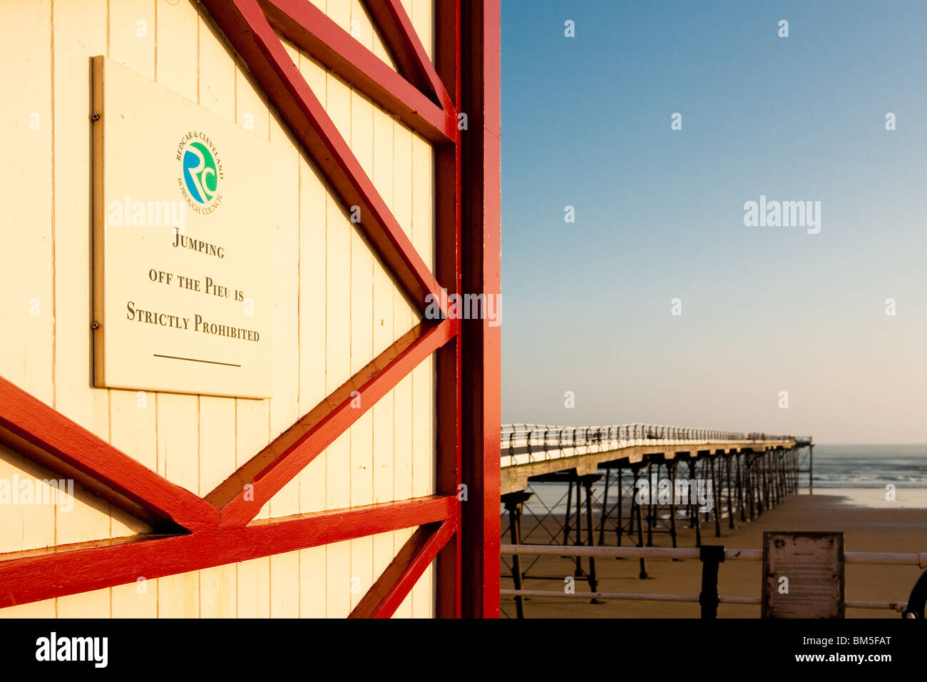 Warning Signs on the pier Saltburn by-the-Sea, Cleveland, England Stock ...