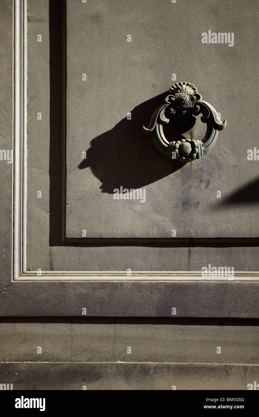 Fancy door knocker in Milan, Italy Stock Photo - Alamy