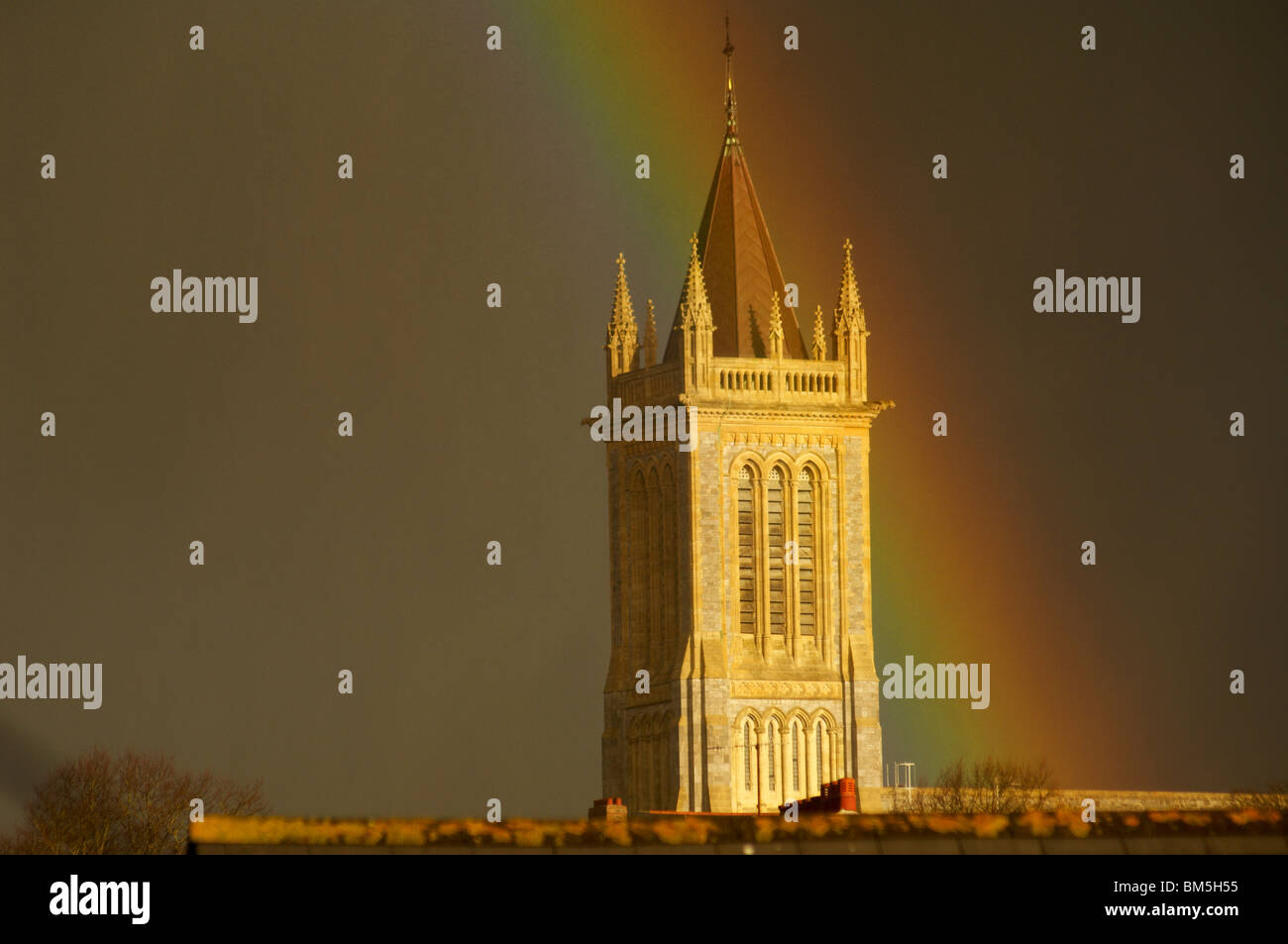 Rainbow appears over St Peters Church in Plymouth Devon UK Stock Photo ...