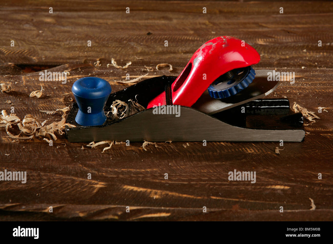 planer carpenter hand tool wood shaving over wooden board Stock Photo ...