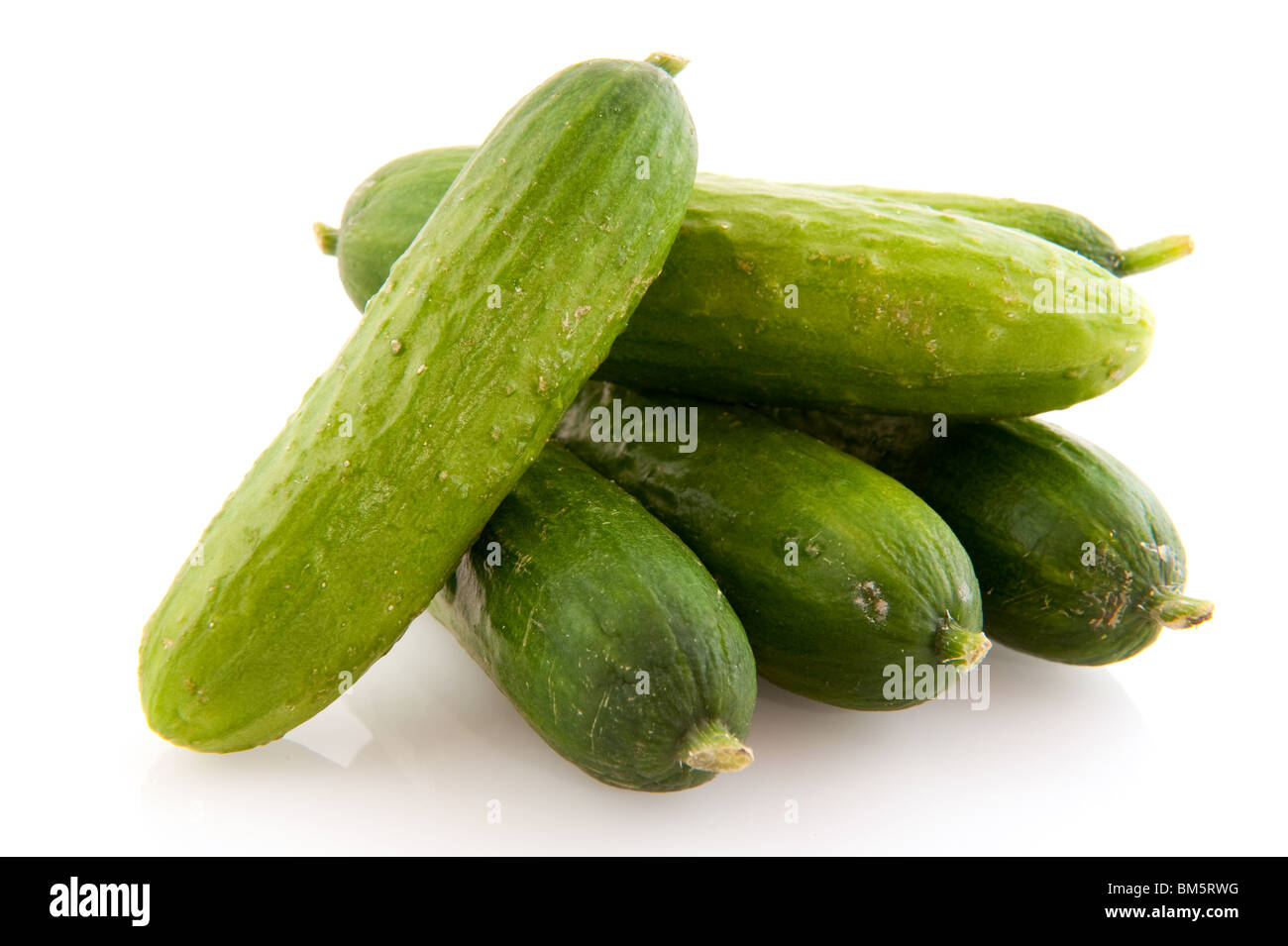 Fresh green cucumber isolated on white background Stock Photo - Alamy