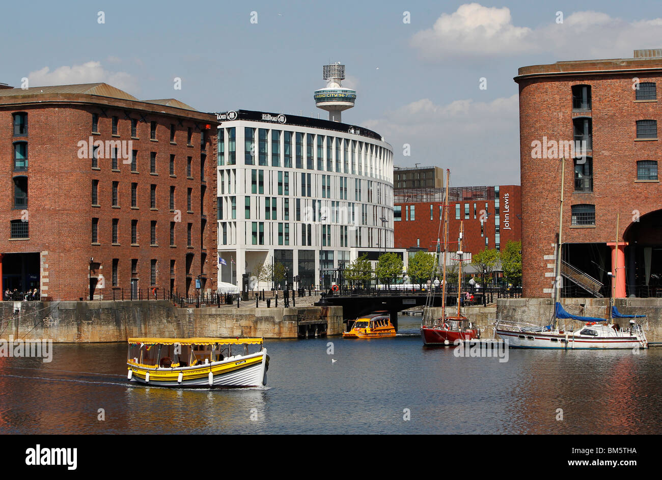 The liverpool Duck seen in the Albert Dock with the Hiton Hotel in the ...