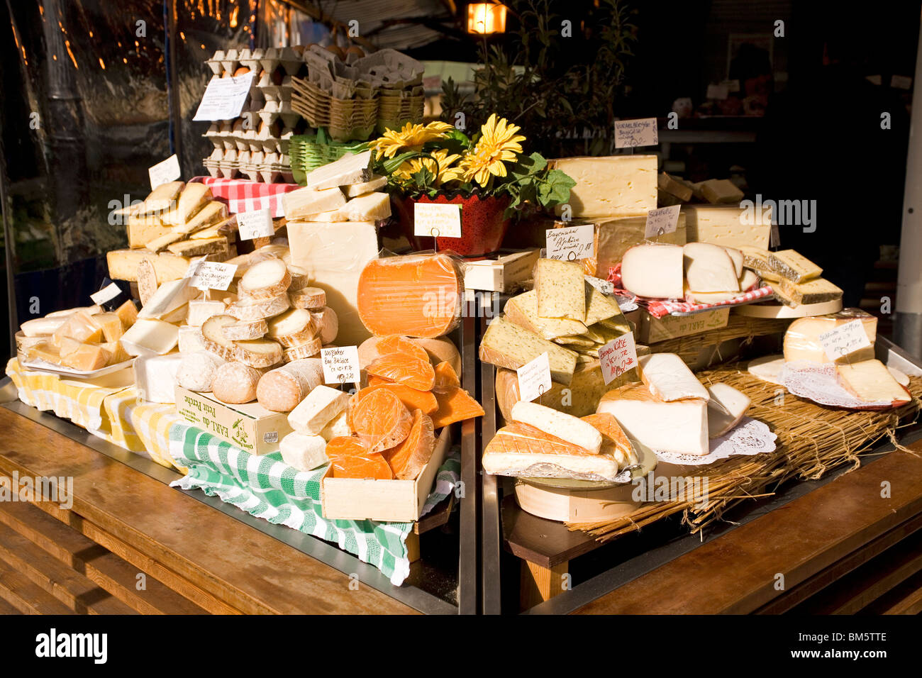 Gourmet cheeses for sale at the Viktualienmarkt in Munich, Germany ...