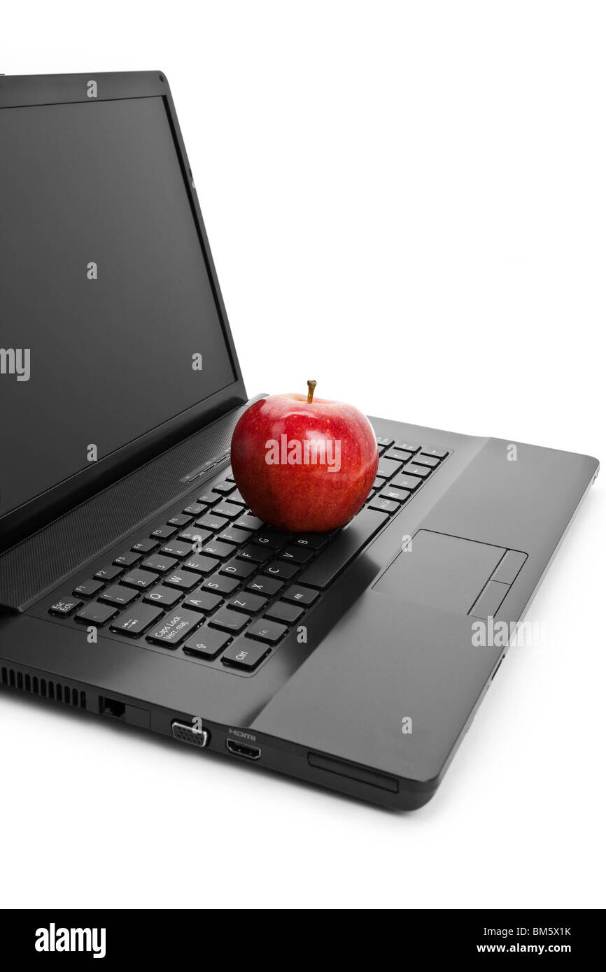 Computer Keyboard and red apple close up Stock Photo - Alamy
