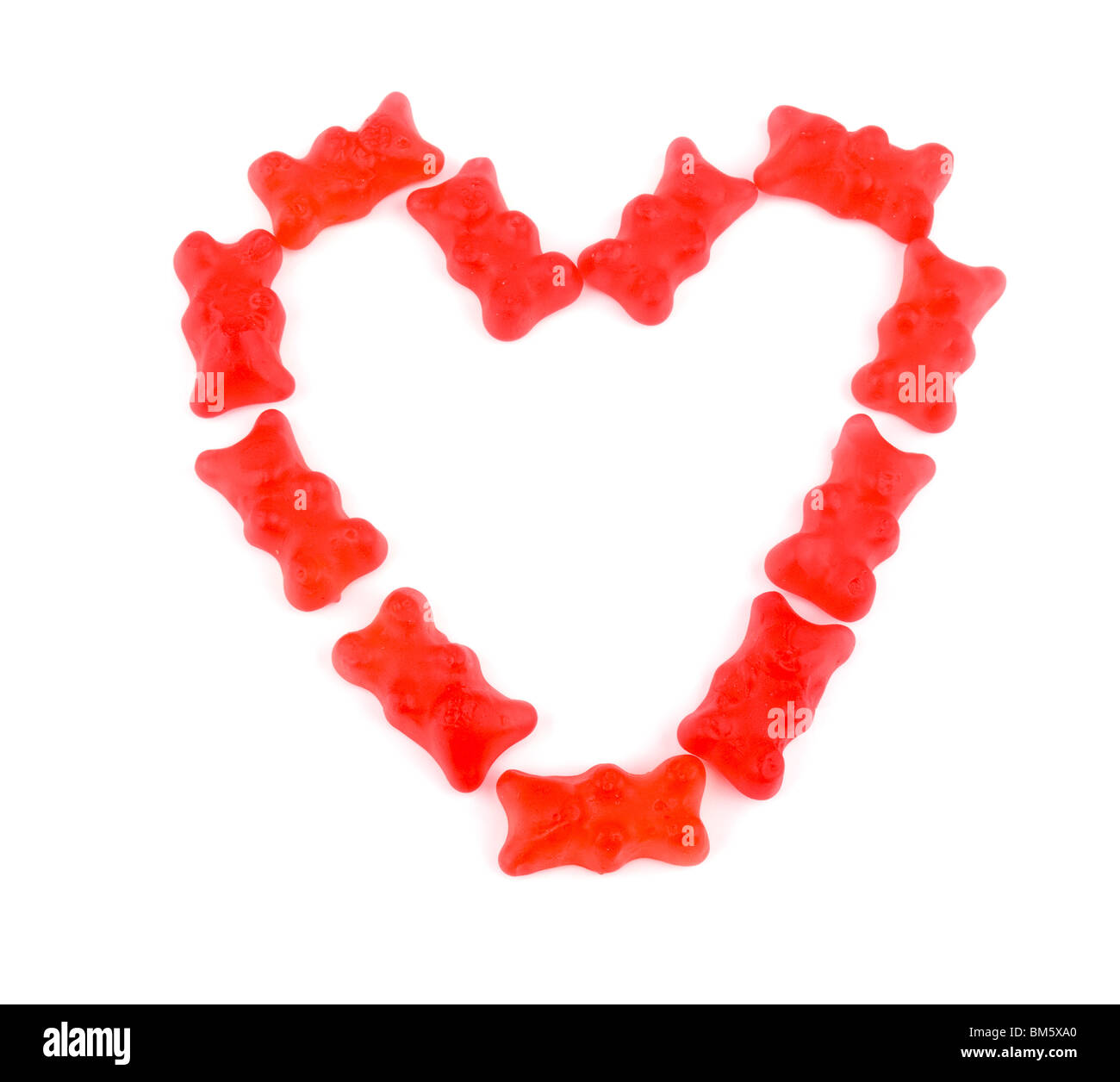 Red gummy bears on white background Stock Photo - Alamy