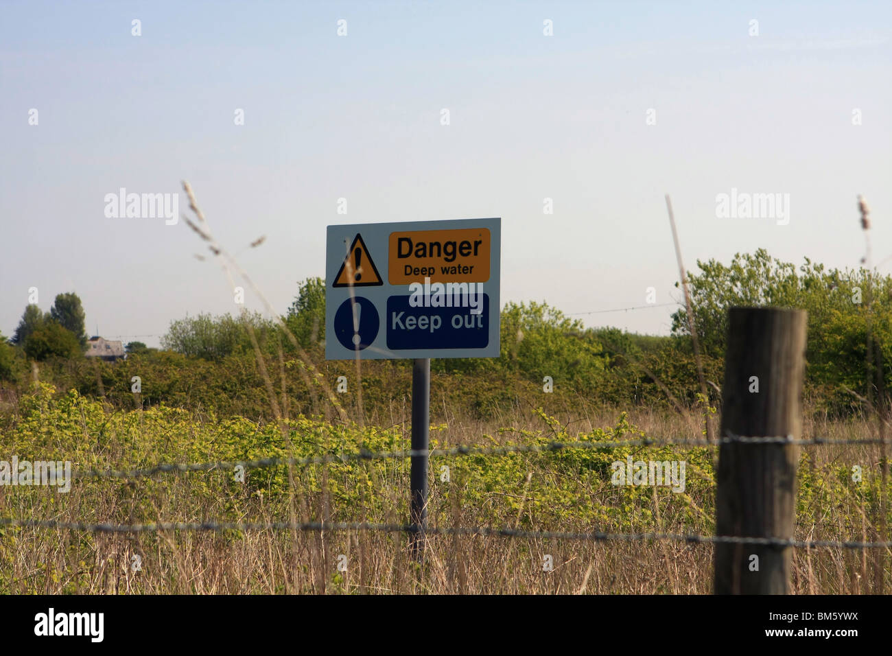 A warning sign - deep water please keep out Stock Photo - Alamy