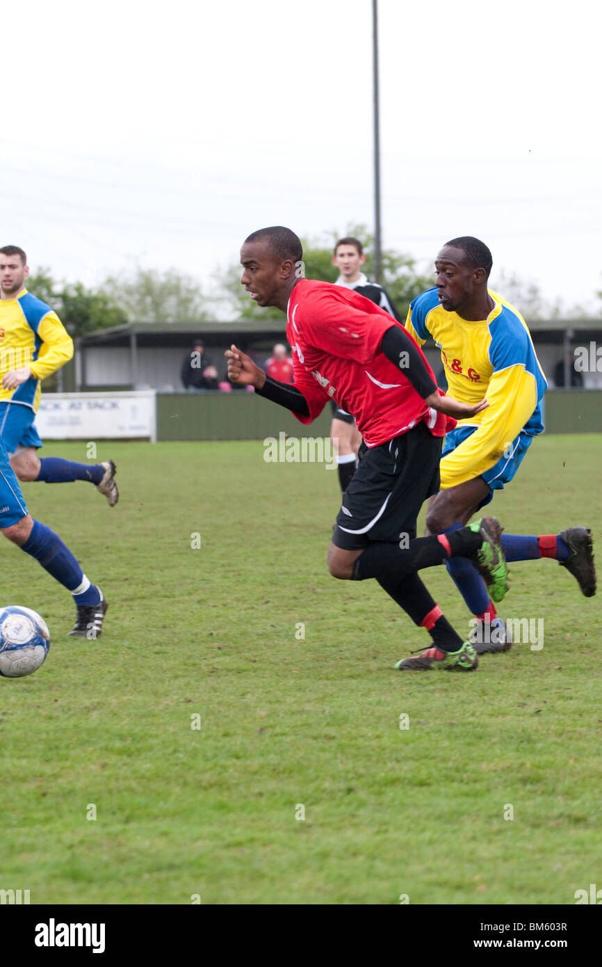 A local footballer on the attack Stock Photo - Alamy