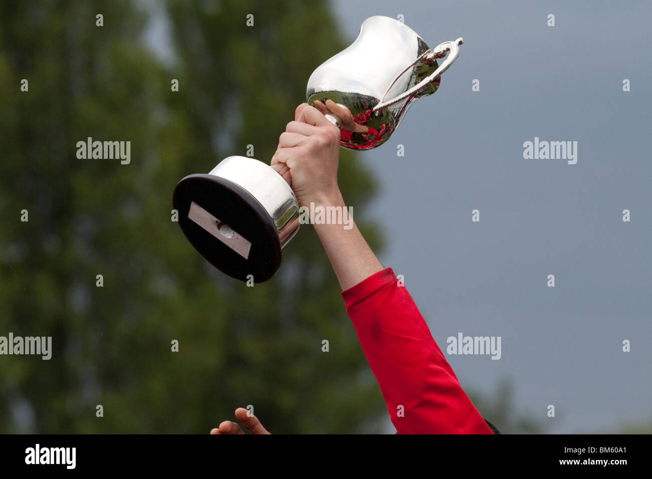 Celebration man of the match trophies trophy football hi-res stock ...
