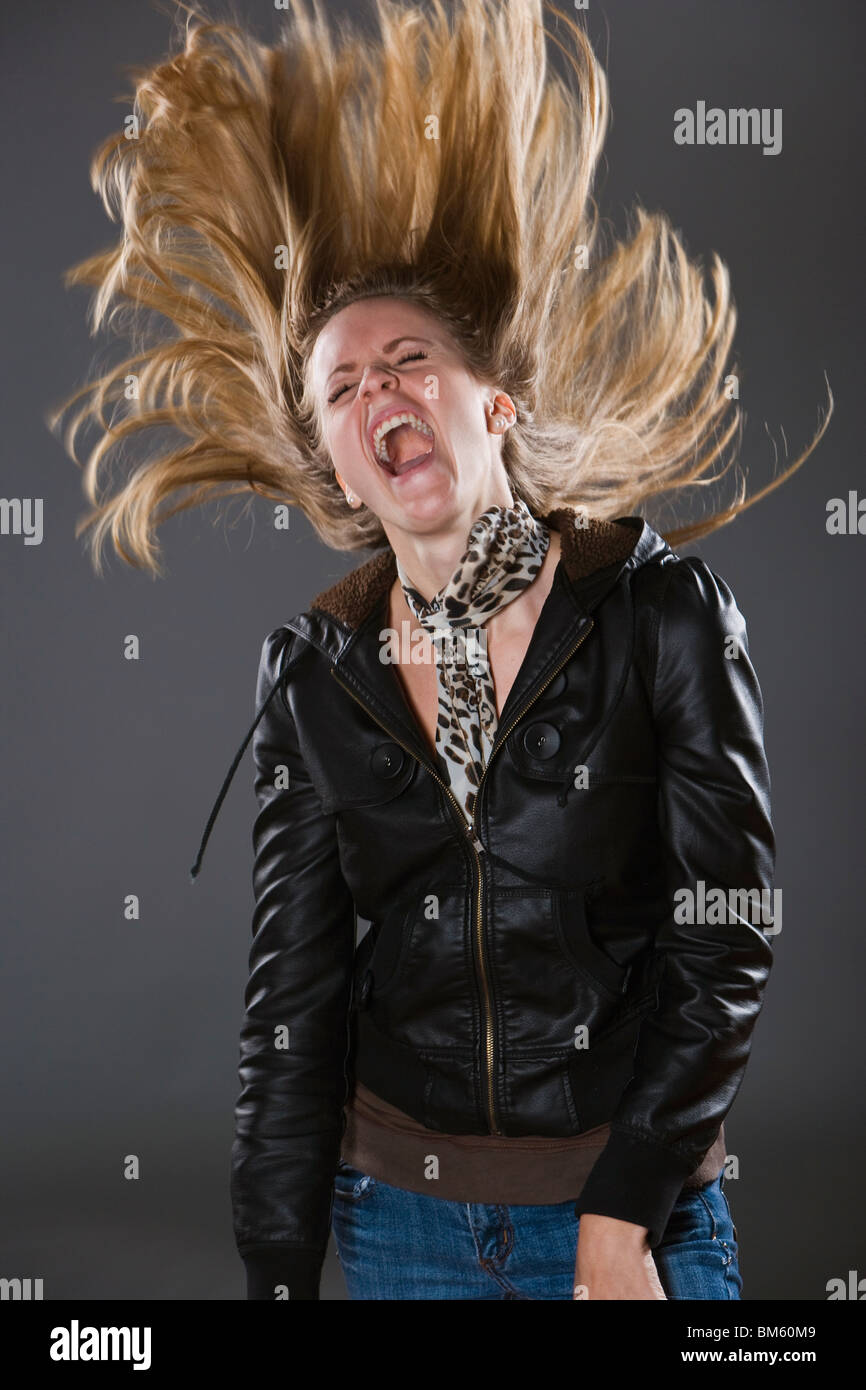 Blond woman screaming Stock Photo - Alamy