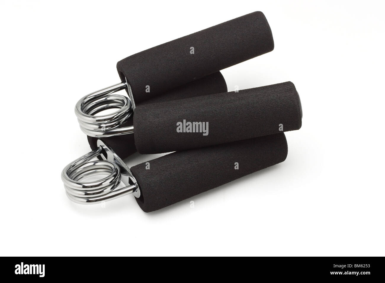 Two hand exercisers on white background Stock Photo - Alamy
