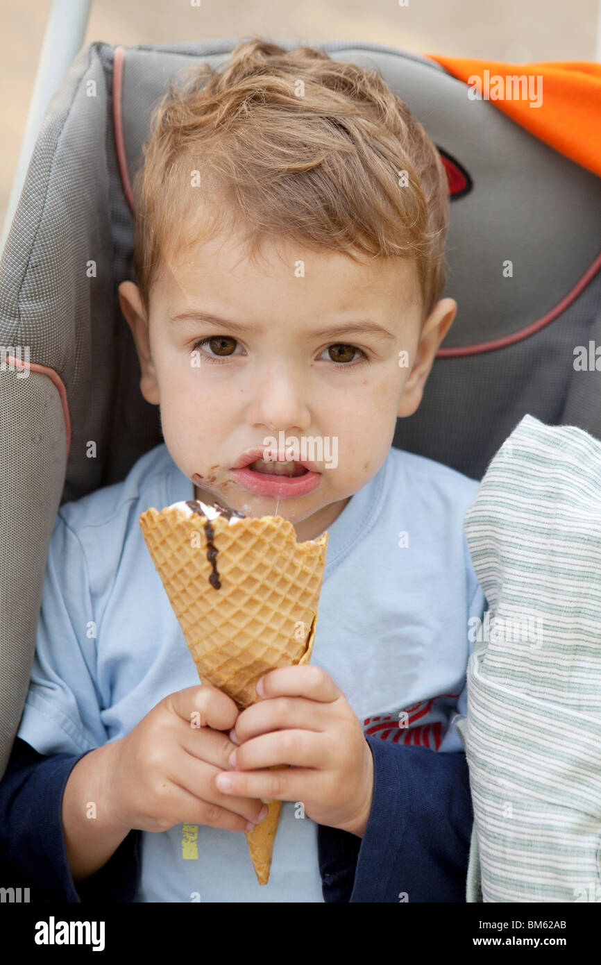 small baby eating ice-cream Stock Photo - Alamy