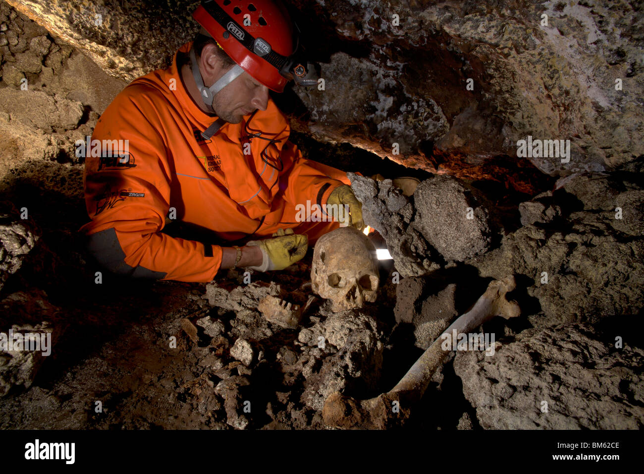 Dr Maciej Sobczyk archaeologist working in the cave R 57 near Hanga Roa ...