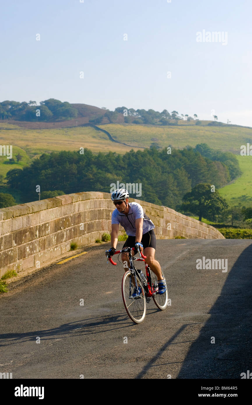 Cyclist on Burholme Bridge Forest of Bowland Lancashire England ...
