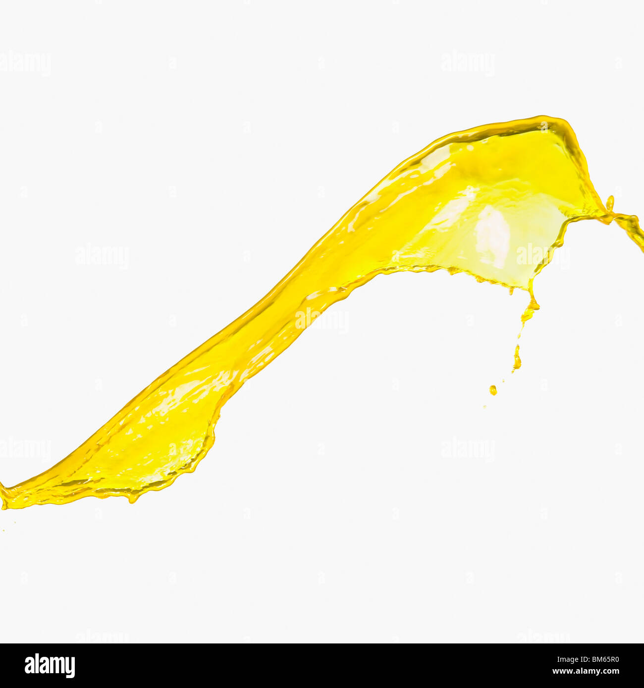 Splash of yellow paint on a white background Stock Photo - Alamy