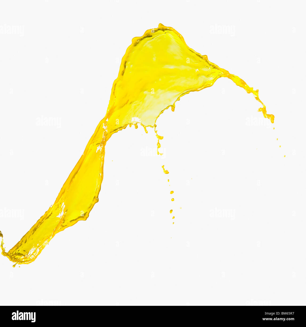 Splash of yellow paint on a white background Stock Photo - Alamy