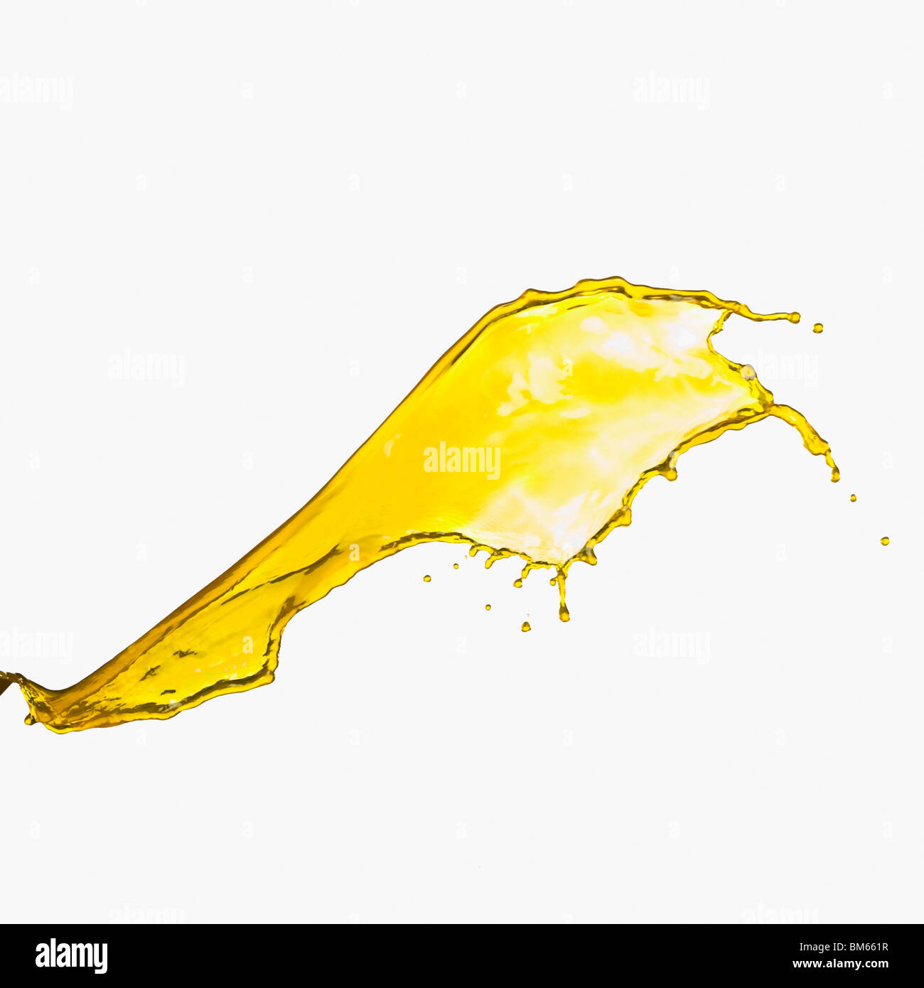 Splash of yellow paint on a white background Stock Photo - Alamy