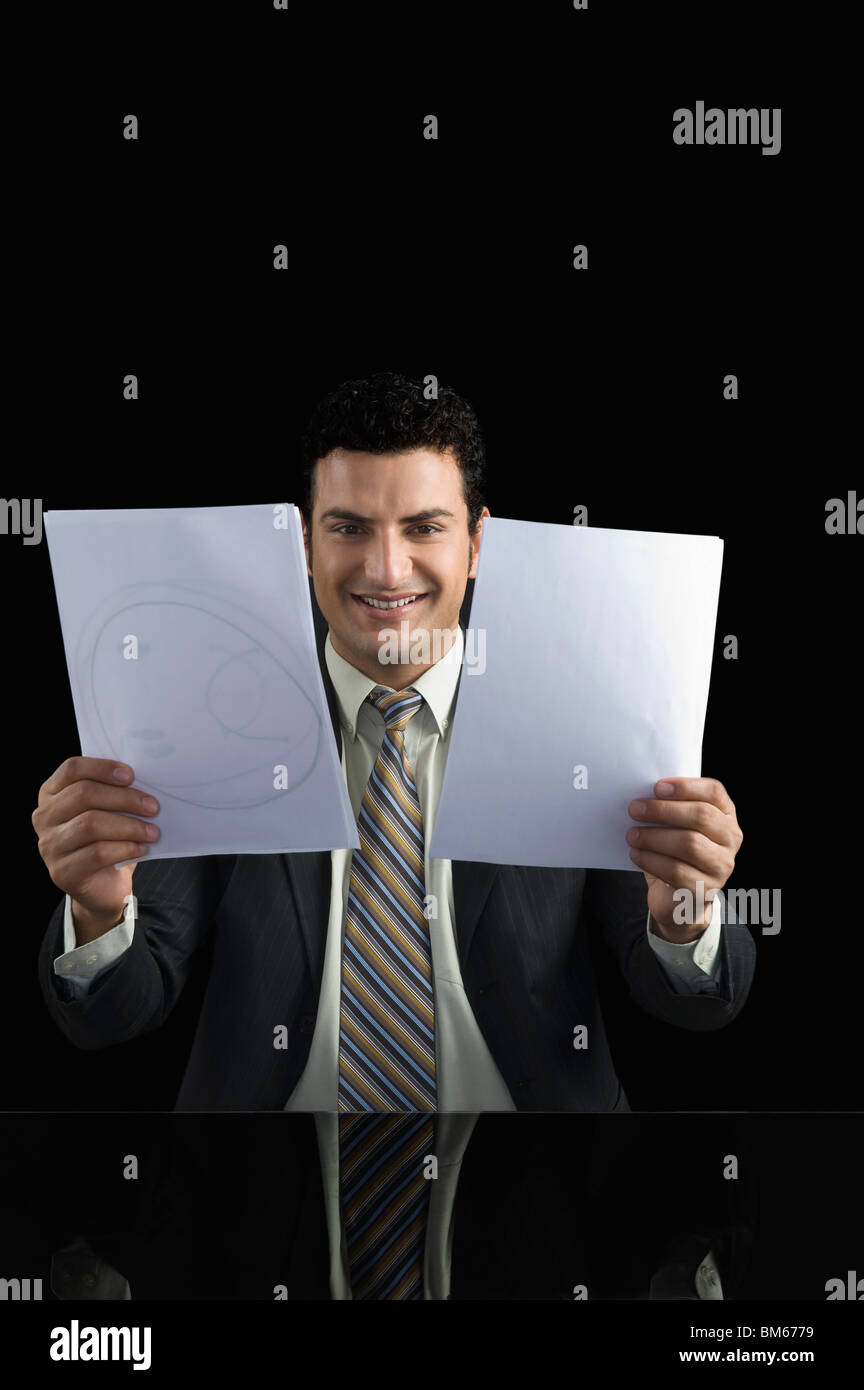 Sitting looking holding document authority hi-res stock photography and ...