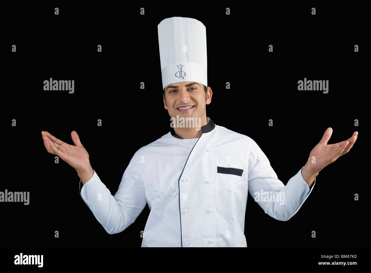 Portrait of a chef smiling Stock Photo - Alamy