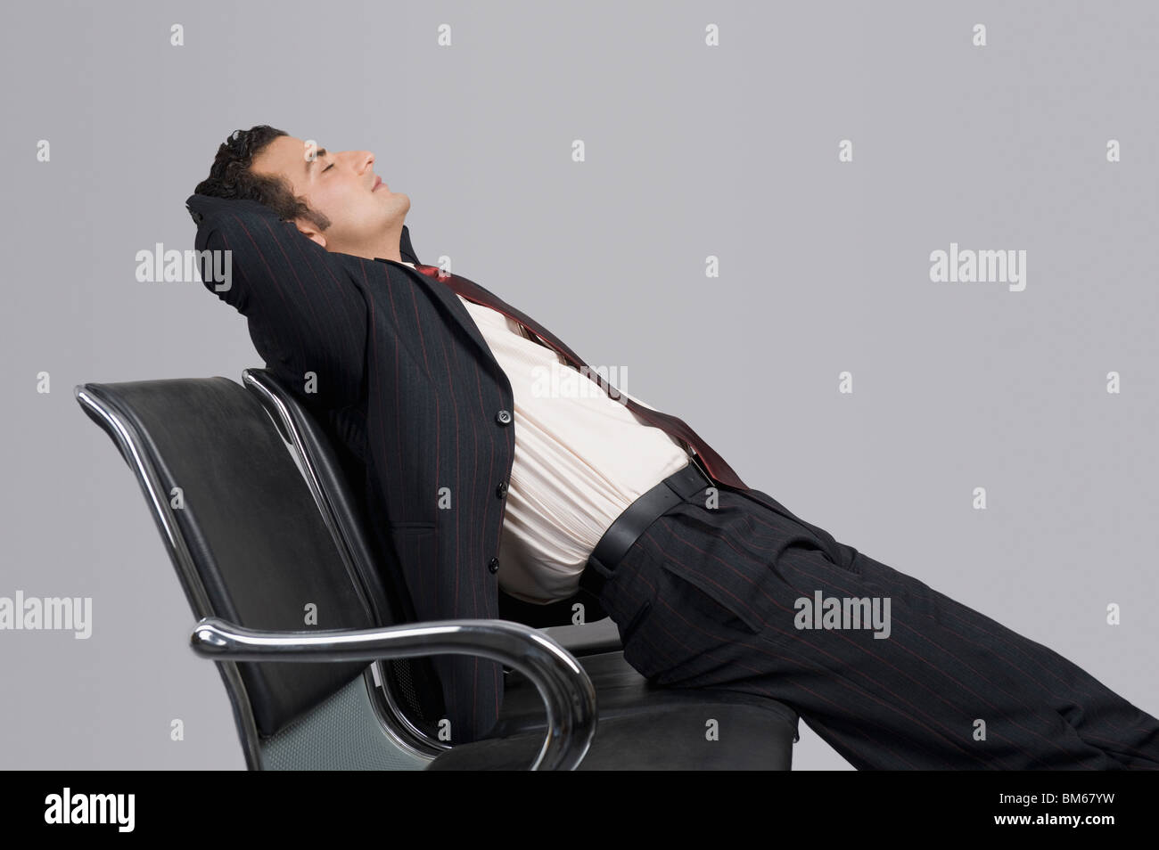 Young indian man relaxing on chair hi-res stock photography and images ...