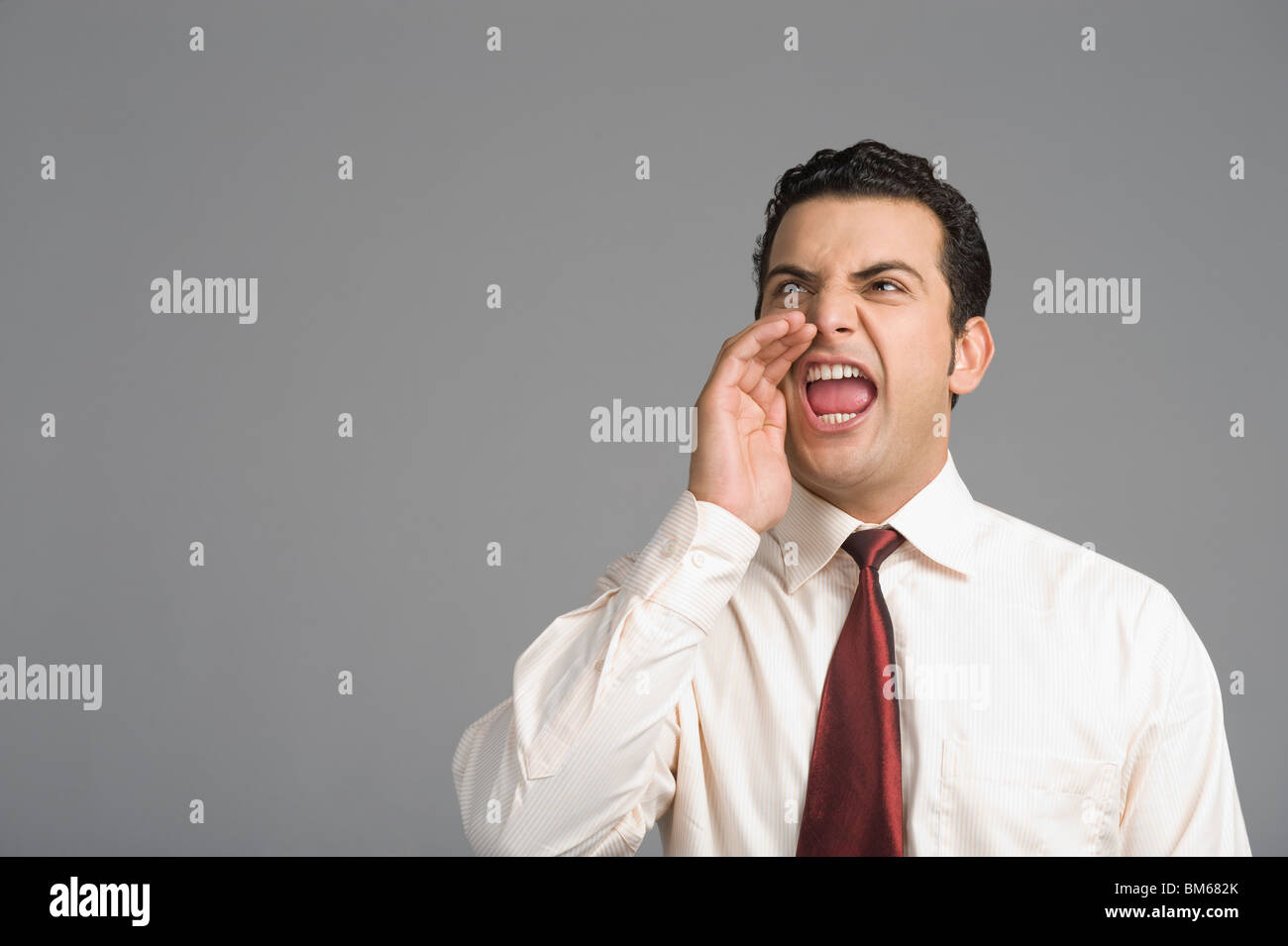 Shouting asian male entrepreneur hi-res stock photography and images ...