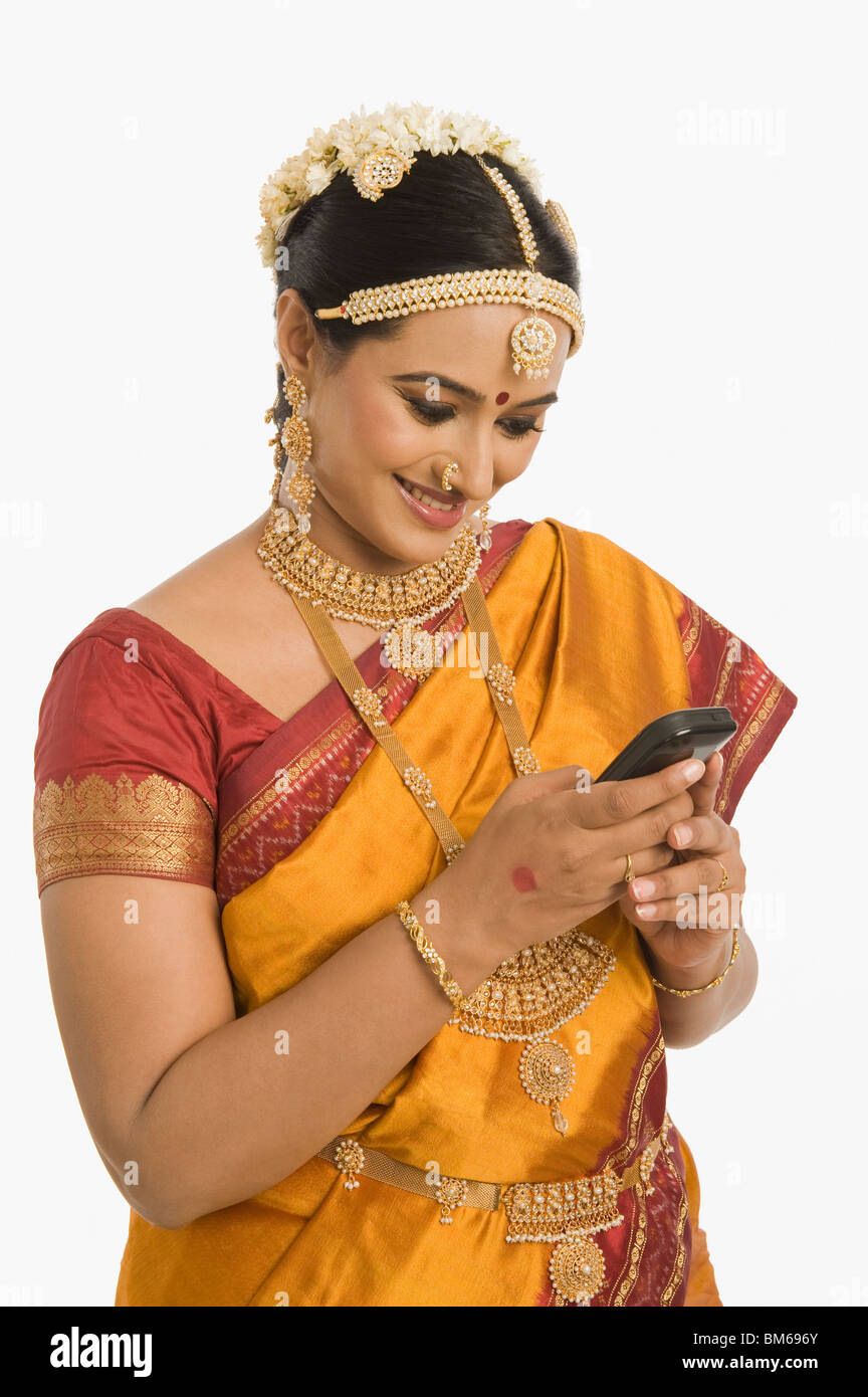 South Indian woman using a mobile phone Stock Photo - Alamy