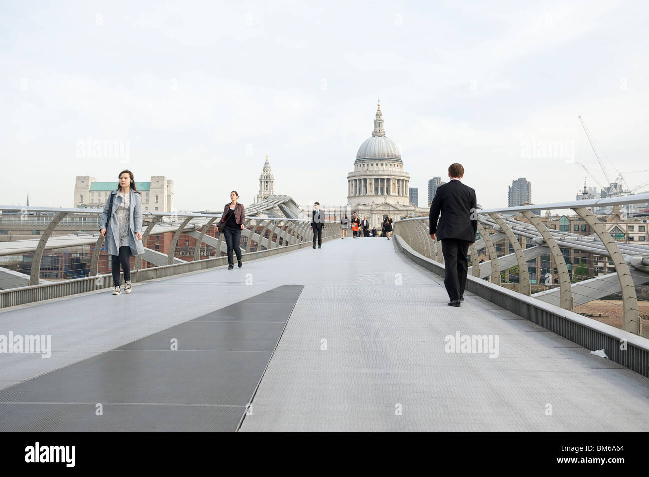 Millennium bridge with people Stock Photo - Alamy