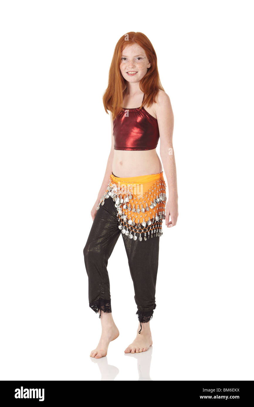 Young Caucasian belly dancing girl in beautiful decorated clothes on ...