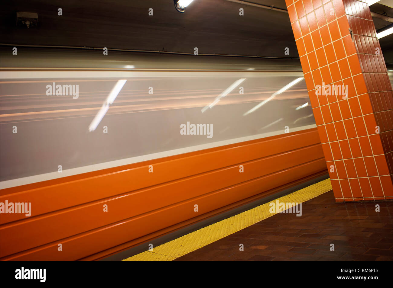 orange line train stop on the mbta in boston massachusetts with train ...