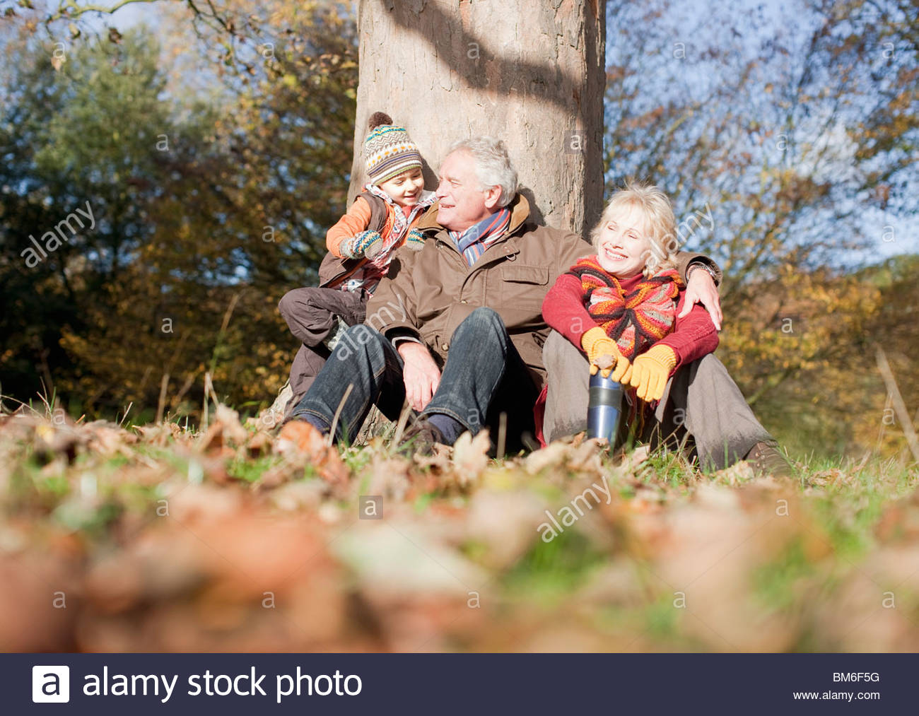 Boy Leaning Against Tree Stock Photos & Boy Leaning Against Tree Stock ...