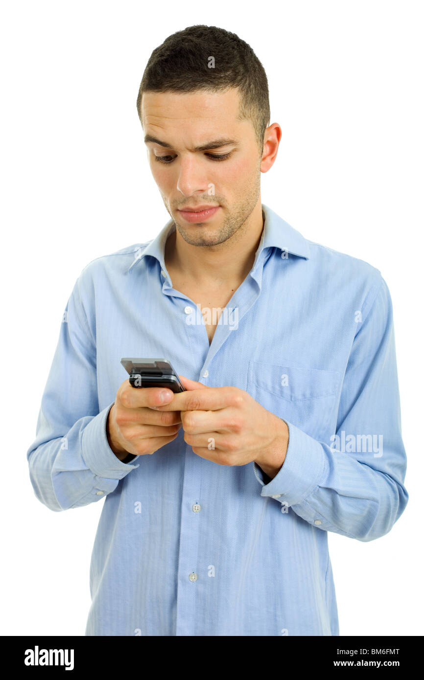 young casual man with a phone, isolated on white Stock Photo - Alamy