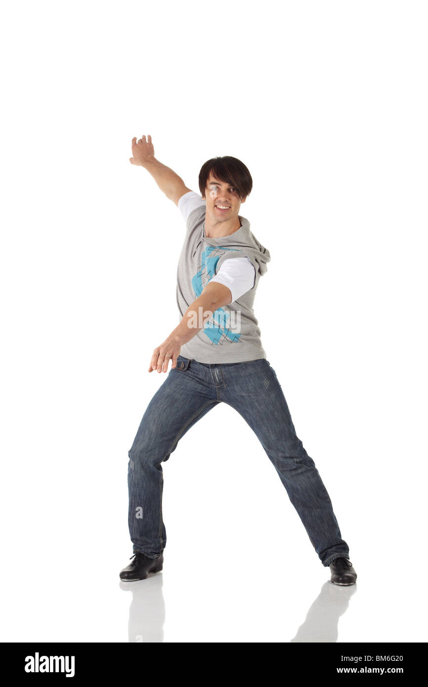 Single Caucasian male tap dancer wearing jeans showing various steps in ...