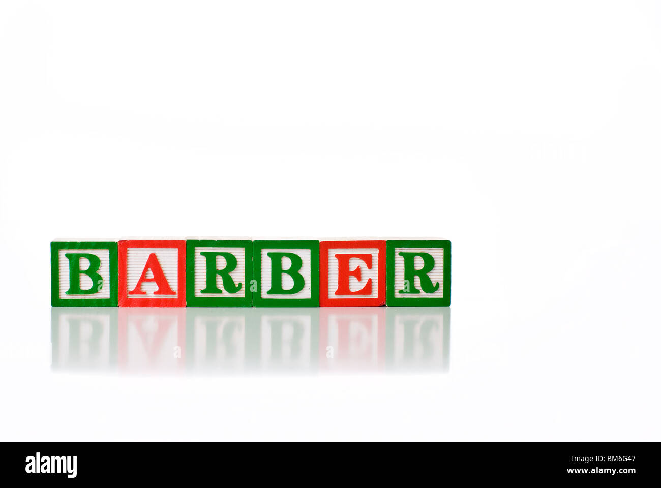 Colorful children's blocks spelling the word BARBER Stock Photo - Alamy