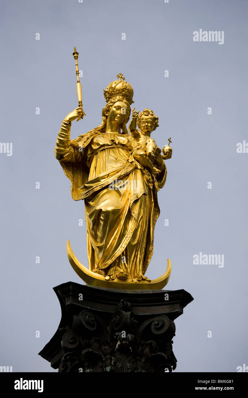 The golden statue of St Mary (Maria) and the Infant Jesus on ...